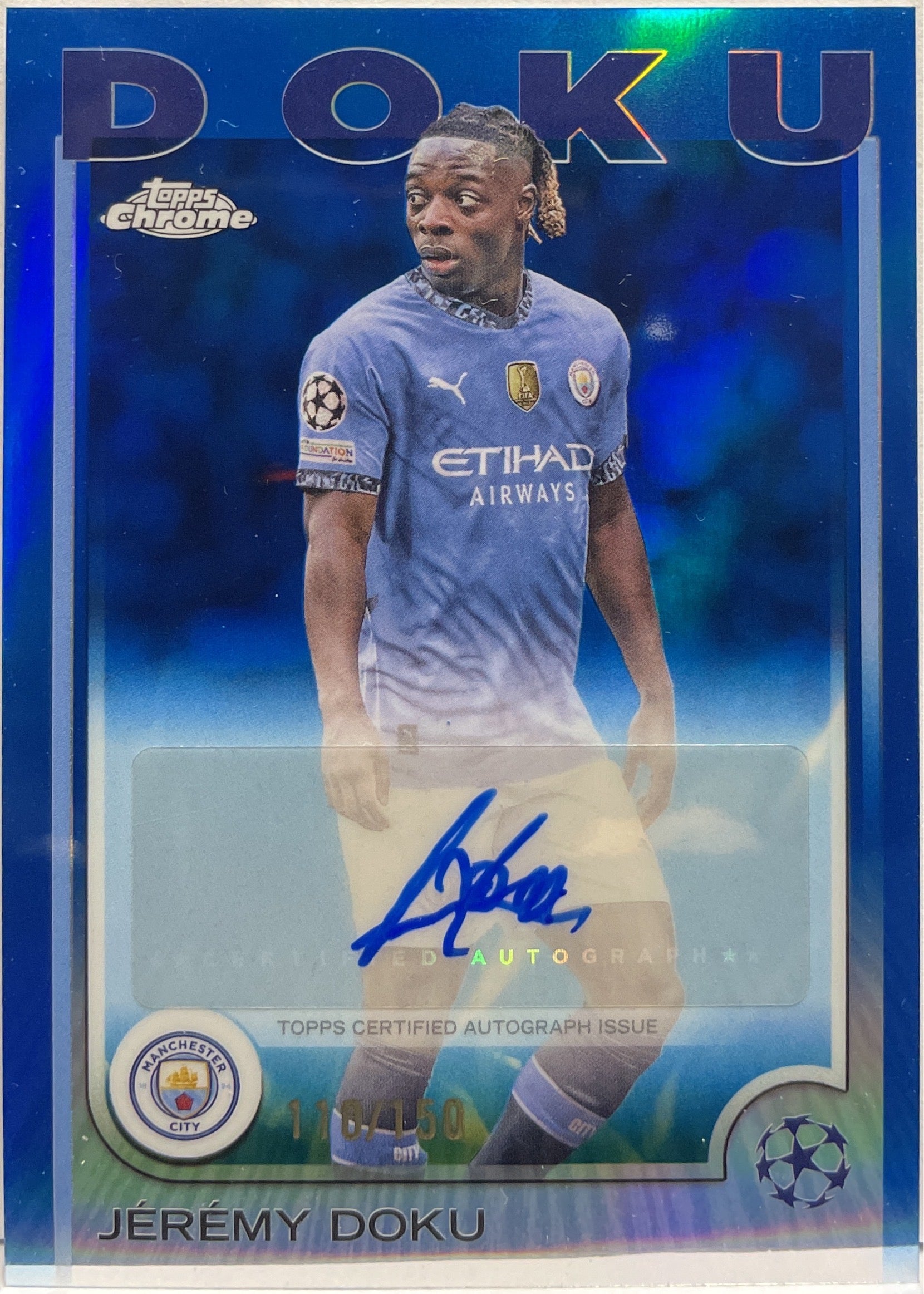 Jeremy Doku 110/150 Autograph Blue Topps Chrome UCC 2024/25 – ScCards
